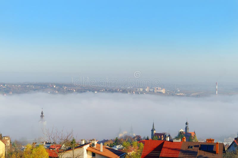 Town in the fog stock photo. Image of clouds, windmill - 48175920