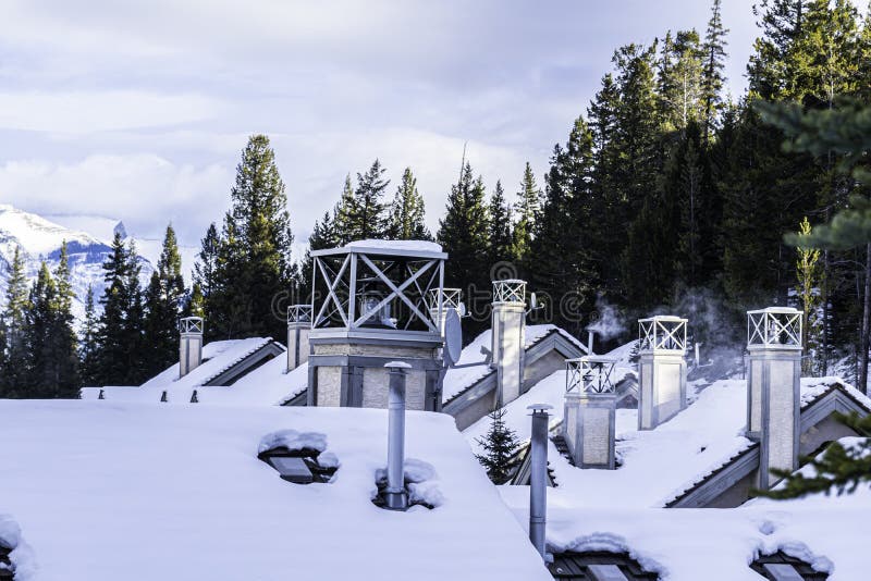 Town Rooftops in Front of Mountain Ranges Stock Image - Image of trees ...
