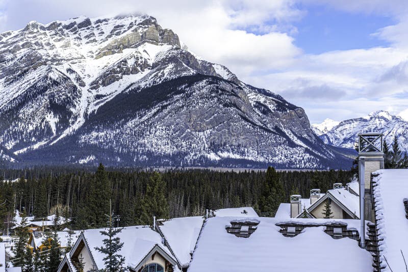 Town Rooftops in Front of Mountain Ranges Stock Image - Image of cold ...