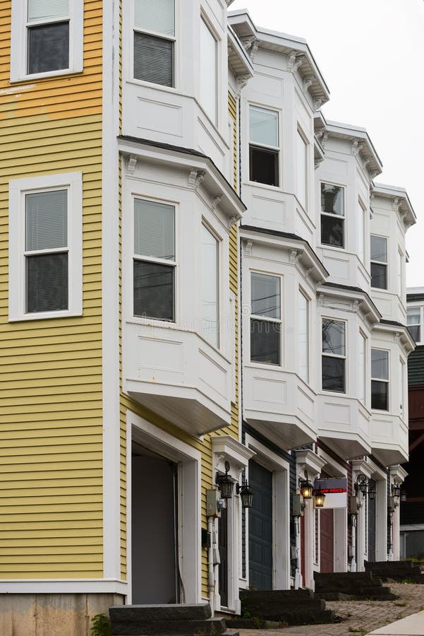 Row of Townhomes with Garages Stock Photo - Image of downtown, housing ...
