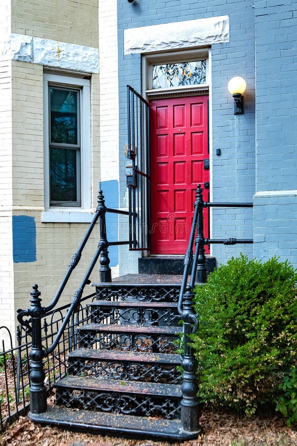 Townhouse Staircase and Front Door. Cast Iron Staircase with Rich ...