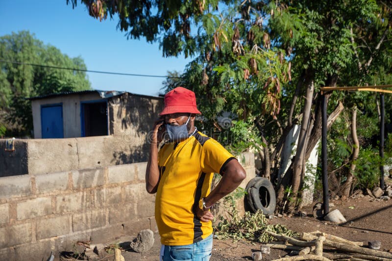 Township life stock image. Image of poor, mask, face - 185702093