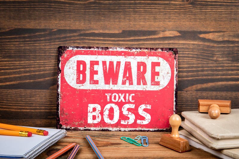 Toxic Boss. Beware Sign with Text on a Wooden Texture Office Table ...