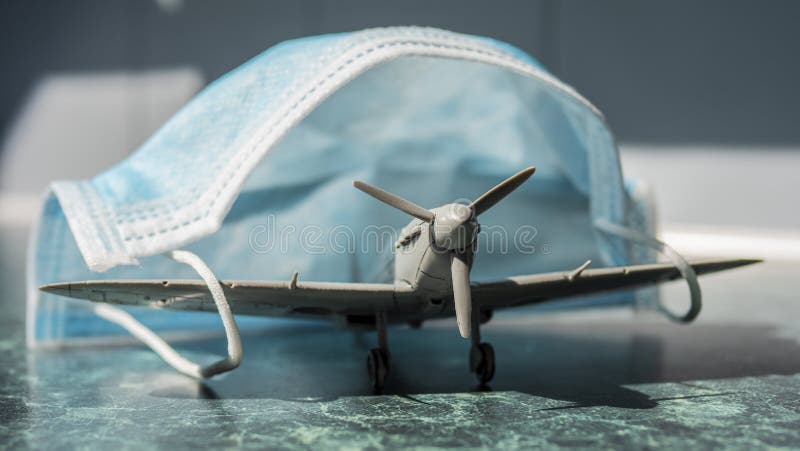 Toy airplane and face mask stock image. Image of corona - 185354963