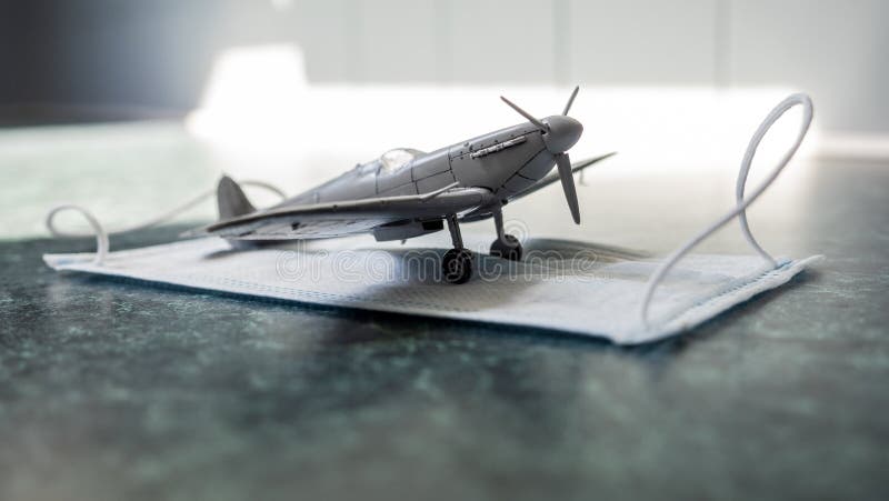 Toy airplane and face mask stock photo. Image of airline - 185354936