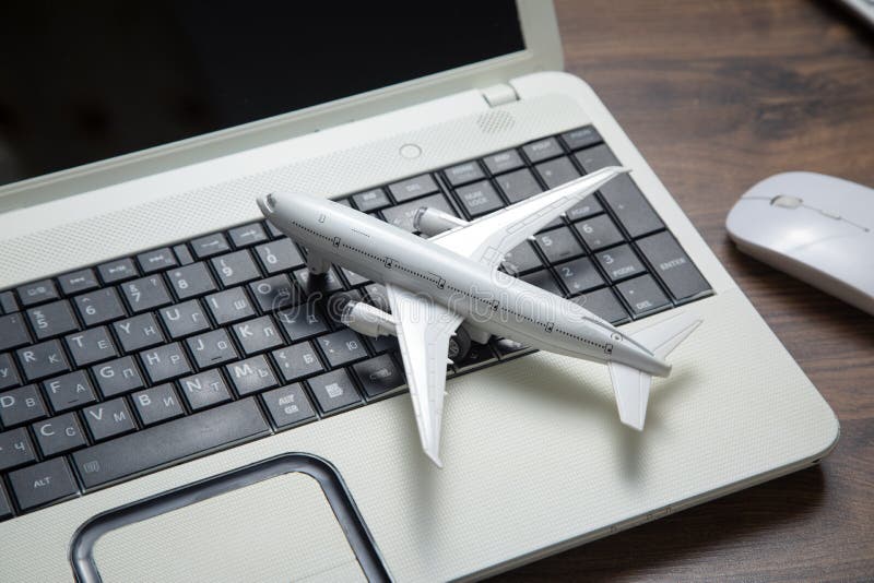 Toy Airplane with a Laptop Computer Stock Photo - Image of worldwide ...