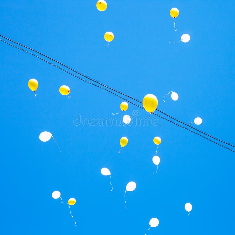 Toy Balloons Float in Blue Sky Stock Image - Image of yellow, city ...