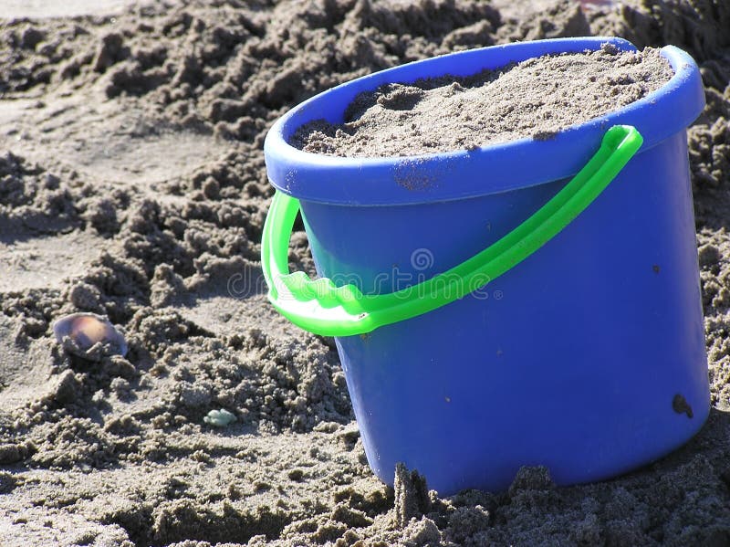 Toy Beach Bucket Full of Sand Stock Photo - Image of sand, outdoors: 104854