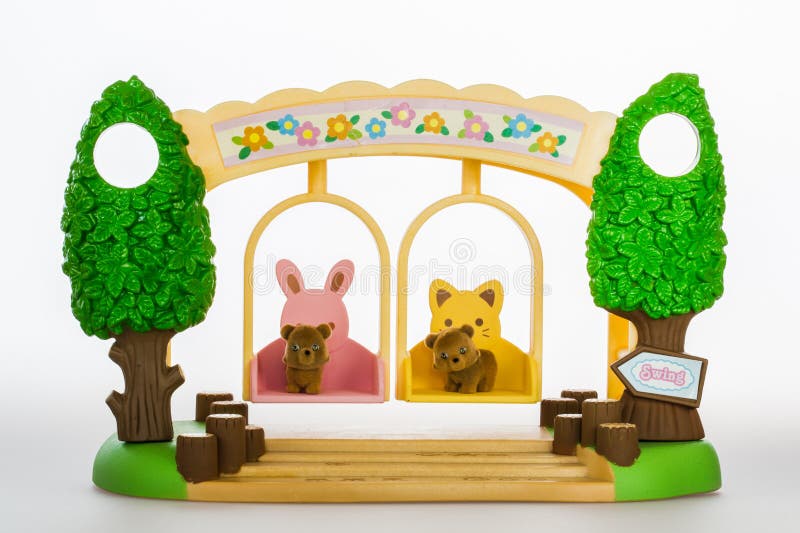 Toy bears on swings stock image. Image of looking, children - 32305569