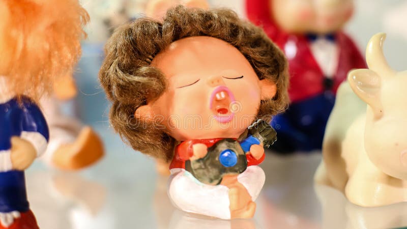 Toy Boy Singing with a Guitar Stock Photo - Image of figure, passionate ...