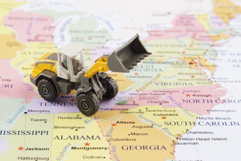 Toy Bulldozer Over the American Map Stock Photo - Image of equipment ...
