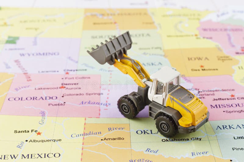 Toy Bulldozer Over the American Map Stock Photo - Image of macro ...