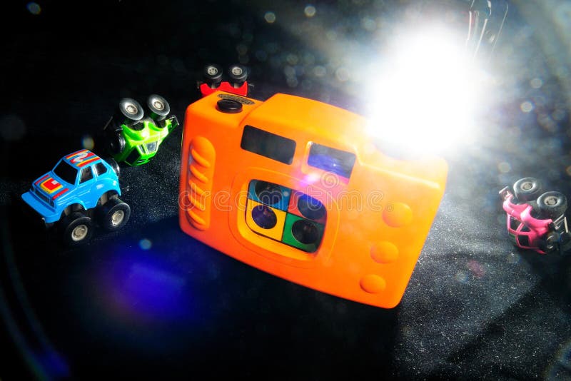 Toy camera and car model stock image. Image of backlight - 15943289