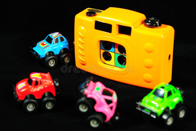 Orange 4-frame toy camera stock image. Image of four - 15943319