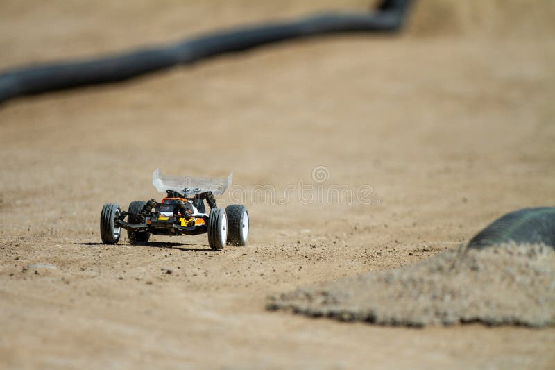 A Toy Car is Driving on a Sandy Surface Editorial Photography - Image ...