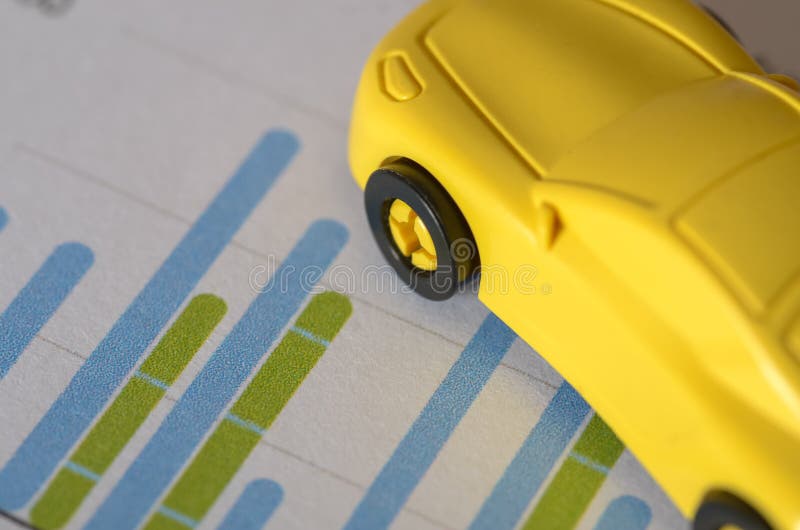 Toy Car Placed on Financial Chart Representing Business Growth Stock ...