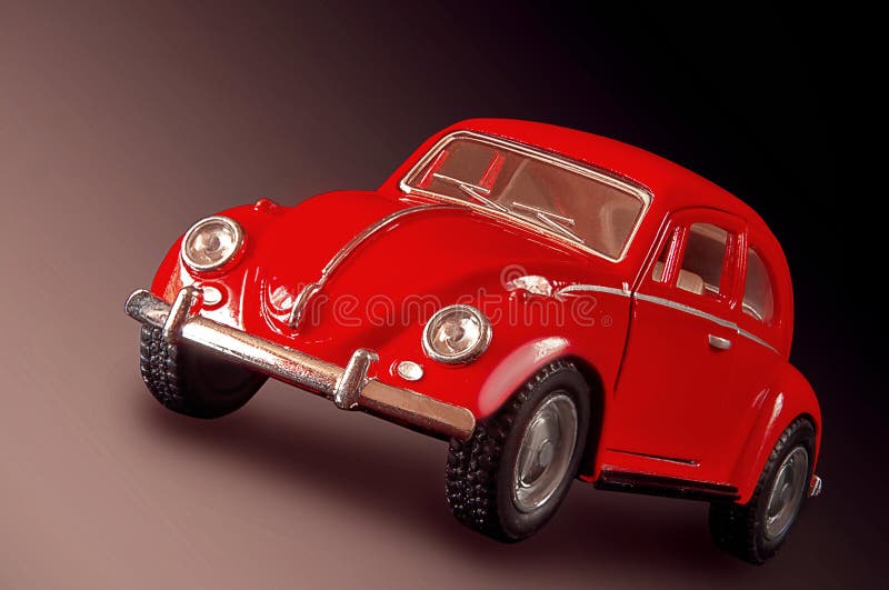 Toy Car of Red Color Against a Dark Background Stock Photo - Image of ...