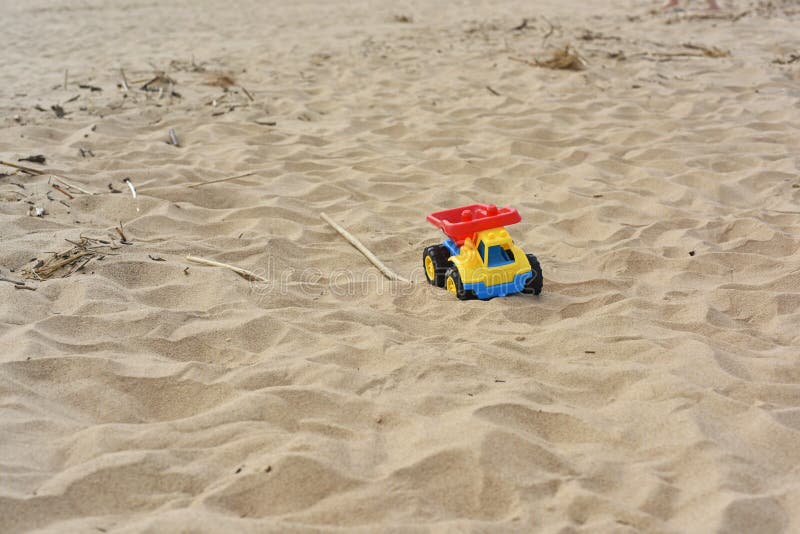 Toy car in the sand. stock photo. Image of dump, concept - 93437102