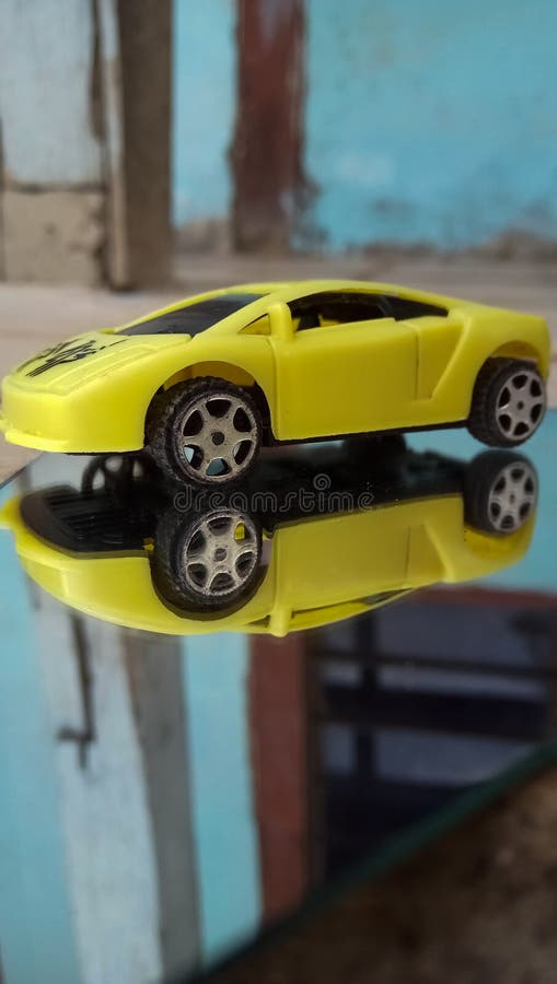 Toy car shadow reflection stock image. Image of shadow - 235019427