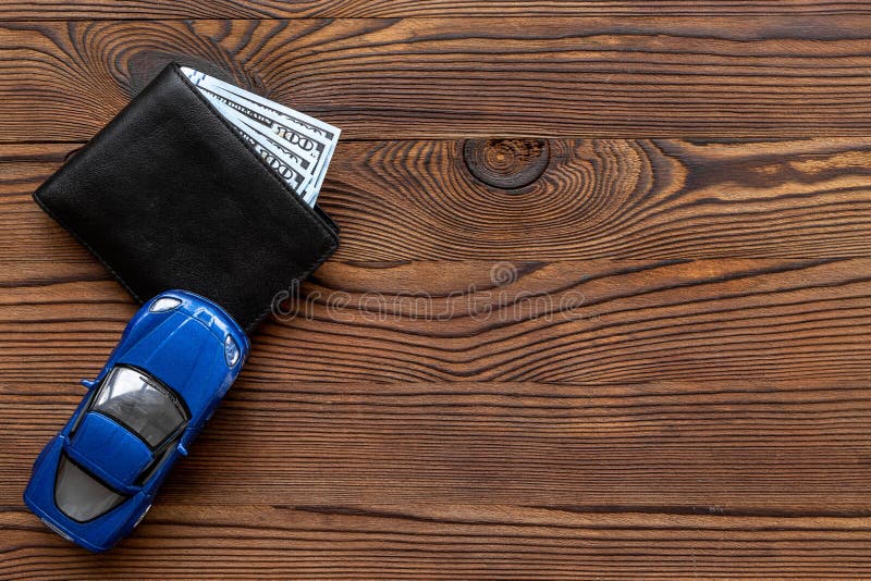 Toy Car with Wallet and Money. Purchase a Car Concept Stock Photo ...