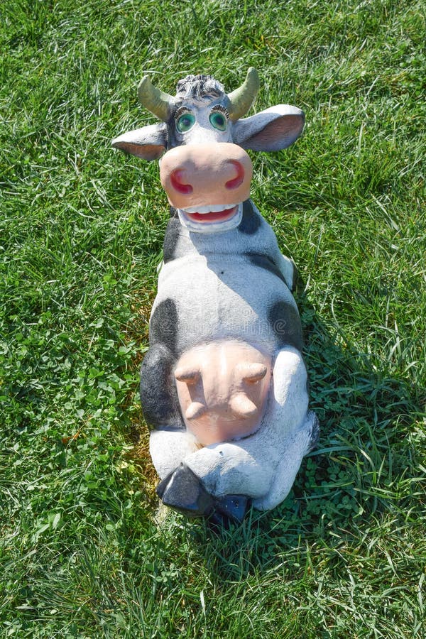 Toy cow lying upside udder stock photo. Image of horned - 78437854