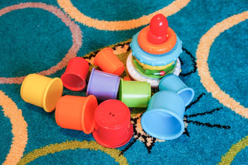 Toy cups stock image. Image of rings, carpet, blue, stacking - 65937315