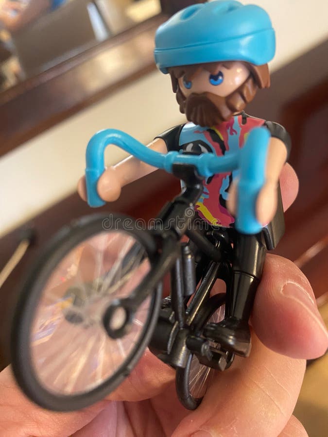 Toy Cyclist with Beard and Blue Helmet Close Up Stock Image - Image of ...