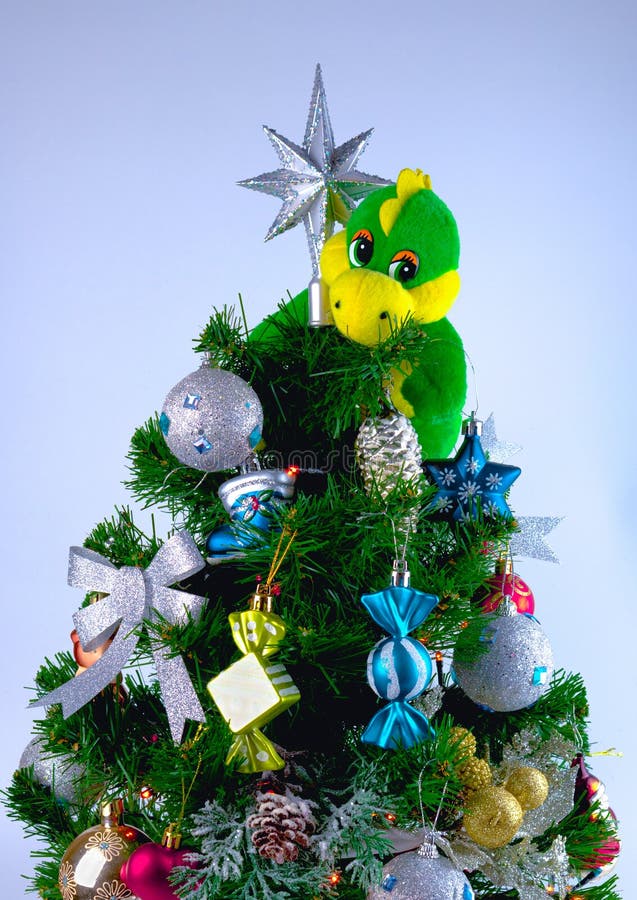 Toy Dragon on Top of the Christmas Tree Stock Image - Image of tree ...