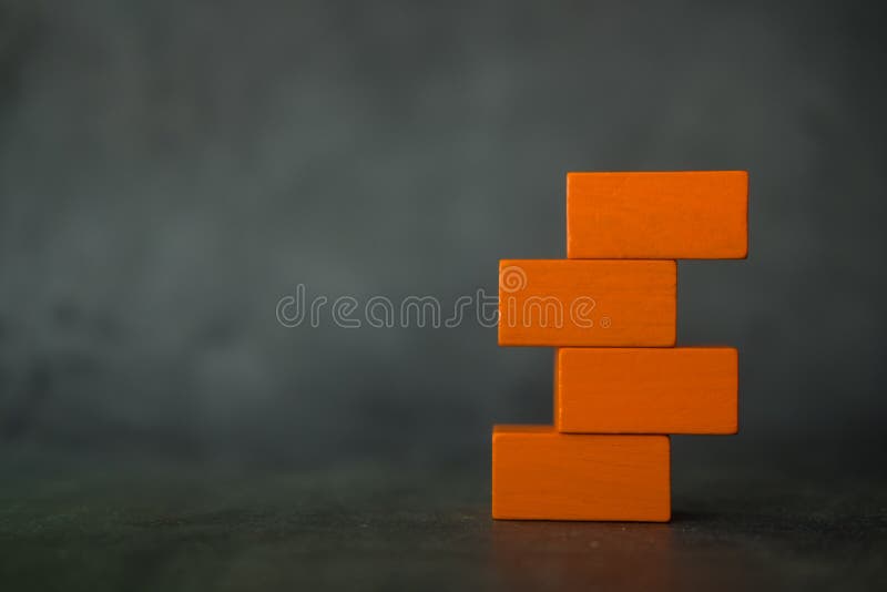 Toy Four Orange Blocks Piled Together Stock Photo - Image of long, baby ...
