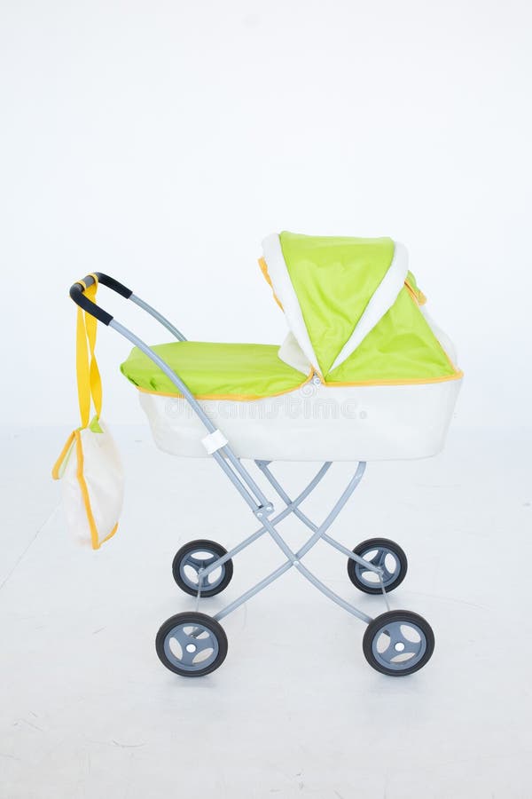 Toy Green Stroller on a White Background Stock Photo - Image of ...