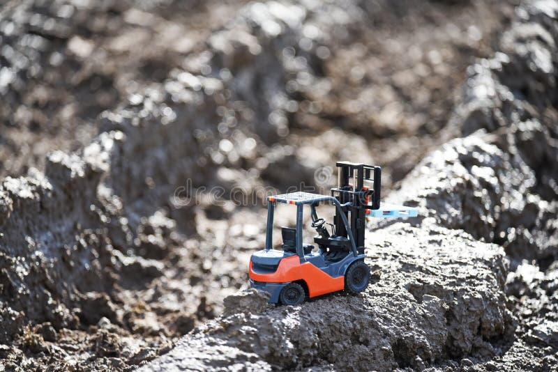 Toy Loader among the Terrain Stock Photo - Image of layout, sunny ...