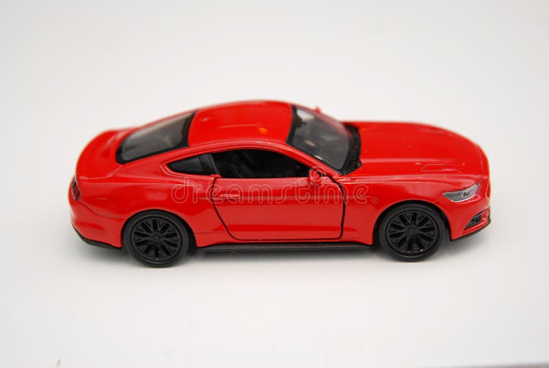 Toy miniature red car stock photo. Image of steering - 85574008