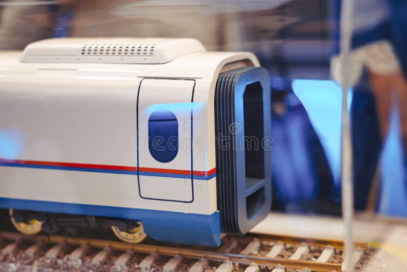 A Toy Model of a Modern Electric Train Stock Photo - Image of house ...