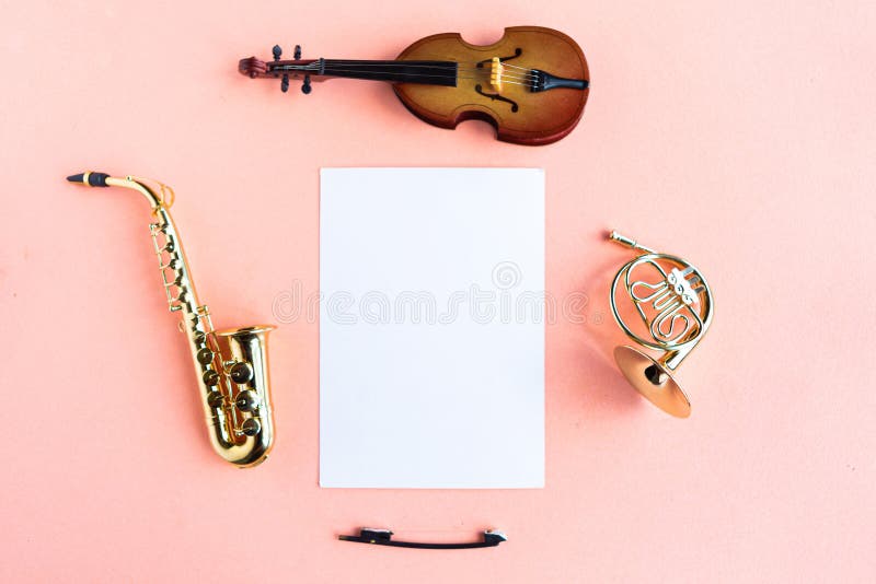 Toy Music Instruments and White Mockup Blank on Pink Background, Top ...