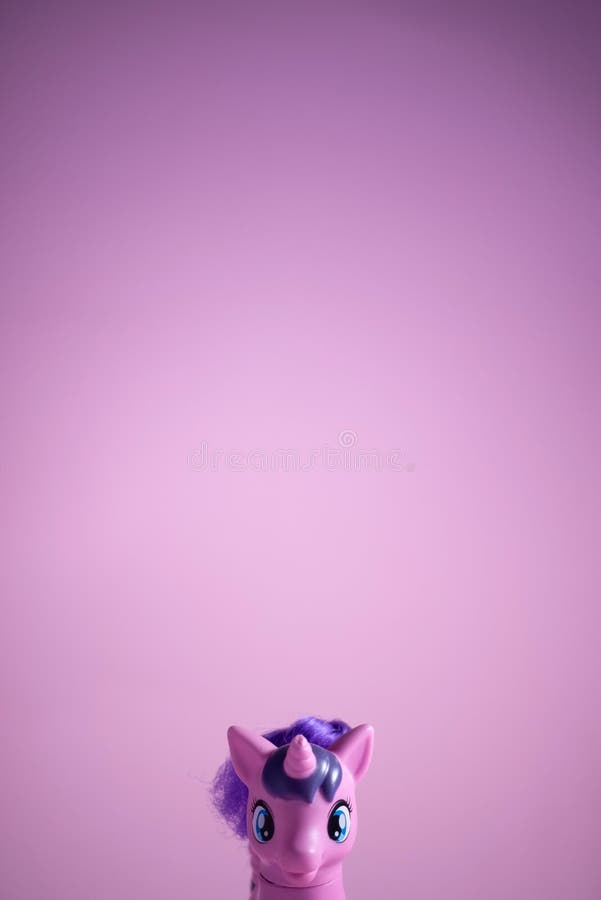 Toy Pink Unicorn Pony on a Pink Background Stock Image - Image of ...