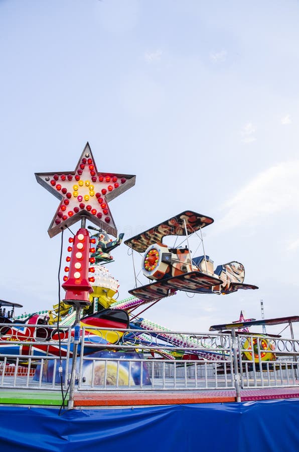Toy Plane Carousel in Amusement Park Stock Image - Image of laughing ...