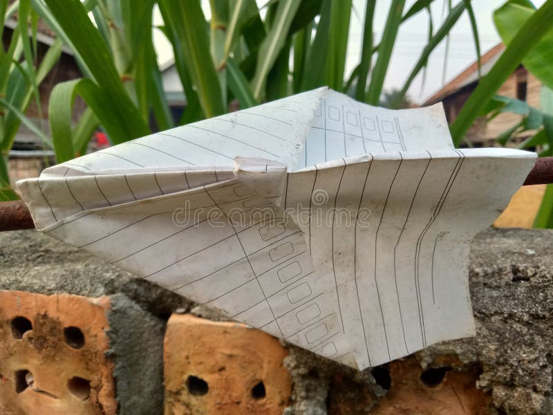 A Toy Plane Made of Tattered Paper Stock Photo - Image of paper, plane ...