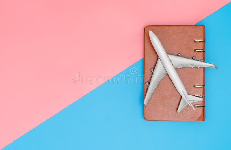 Toy Plane with Notebook for Travel Planning Concept Stock Photo - Image ...