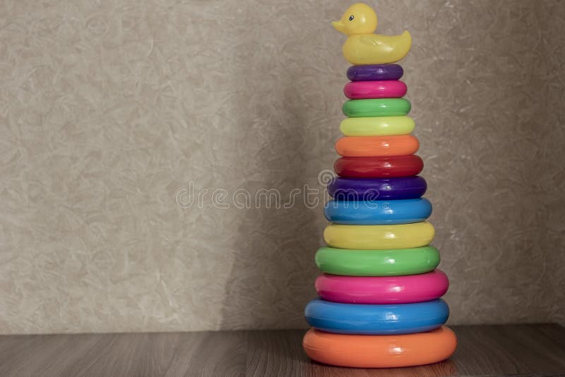 Toy Pyramid from Color Rings Stock Photo - Image of colored, purple ...
