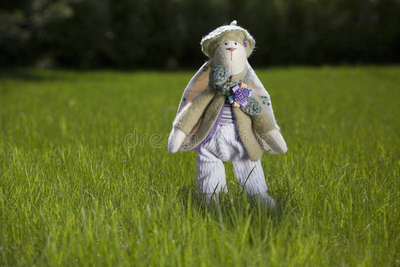 Toy rabbit on grass stock photo. Image of animal, soft - 26194540