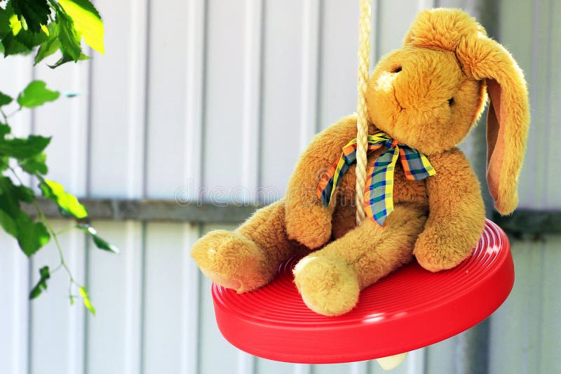 Toy Rabbit on a Tree. Soft Toy Close Up Stock Photo - Image of isolated ...