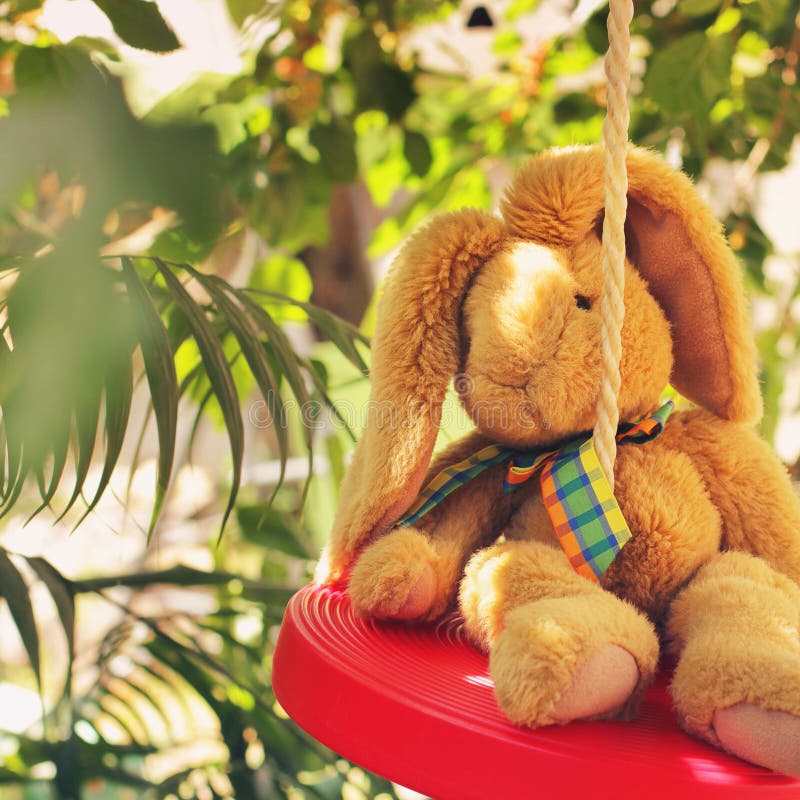Toy Rabbit on a Tree. Soft Toy Close Up Stock Image - Image of felt ...