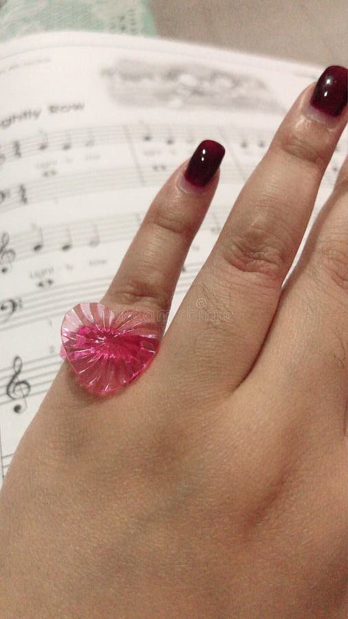 A toy ring on the finger stock image. Image of skin - 290229333