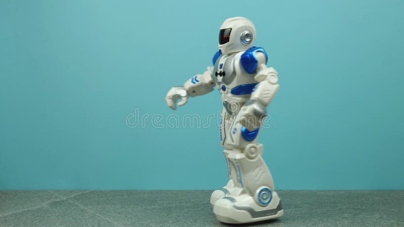 Toy Robot Dancing on Blue Background. Stock Video - Video of music ...