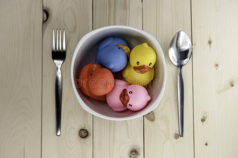 Toy rubber duck on a plate stock image. Image of color - 35946493