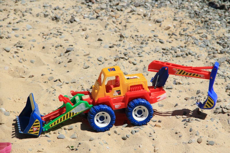 Toy cars in sand castle stock photo. Image of mini, automobile - 4552924