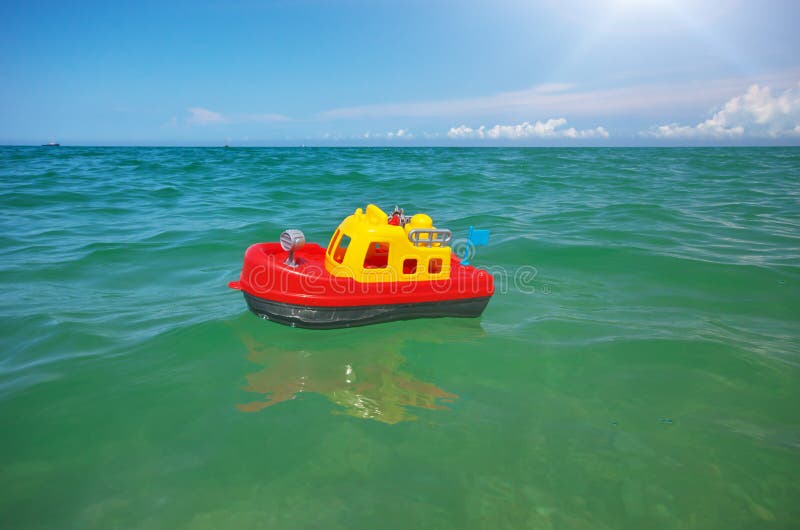 Toy Ship Boat and Sea Wave. Stock Image - Image of idea, cruise: 85593425