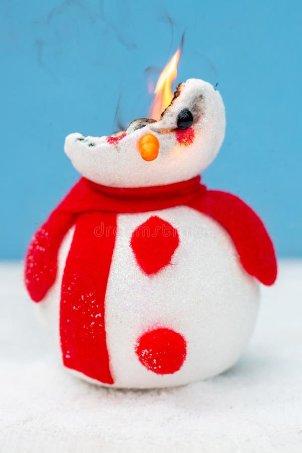 A Toy Snowman is on Fire. Fire for the New Year Stock Photo - Image of ...