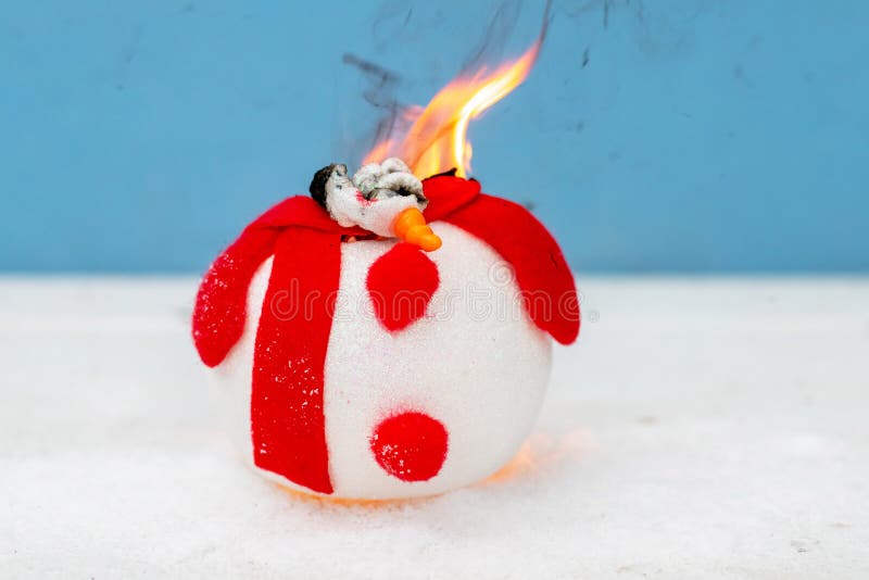 A Toy Snowman is on Fire. Fire for the New Year Stock Image - Image of ...