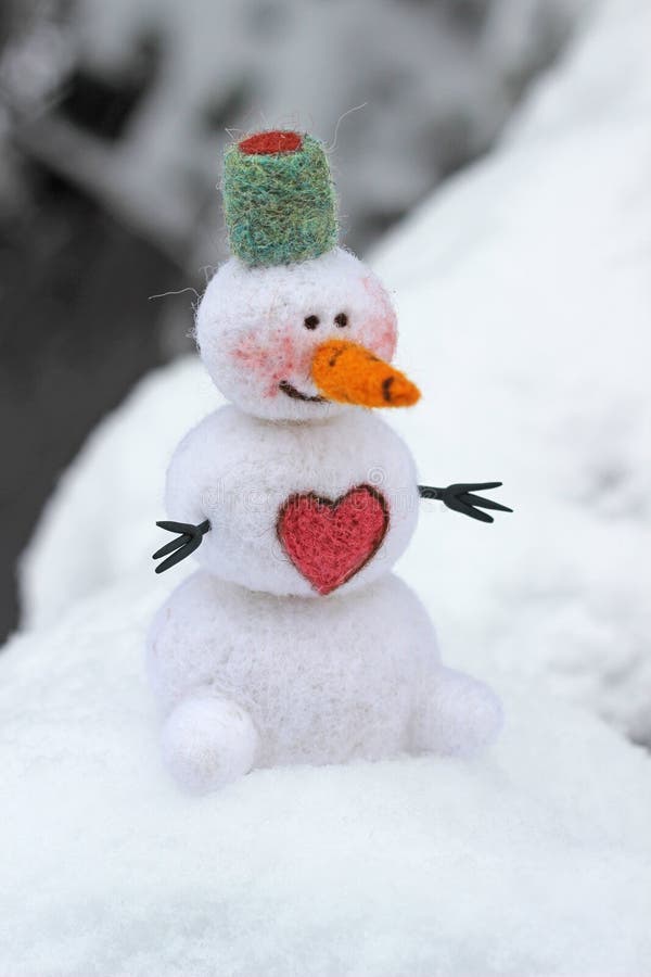 Toy snowman with heart stock photo. Image of carrot, face - 49481952